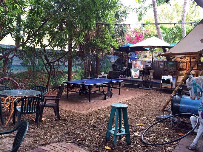The patio games area proves Blue Heaven understands the Key West philosophy: food tastes better when there's zero rush to be anywhere else.