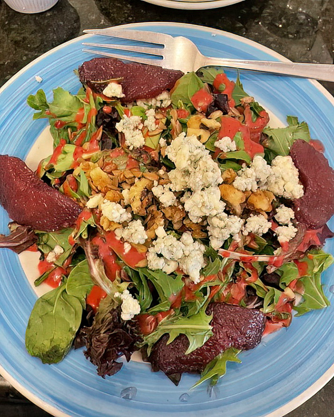 A salad that makes eating greens feel like cheating. Those beets and blue cheese are having a flavor conversation you want to eavesdrop on.