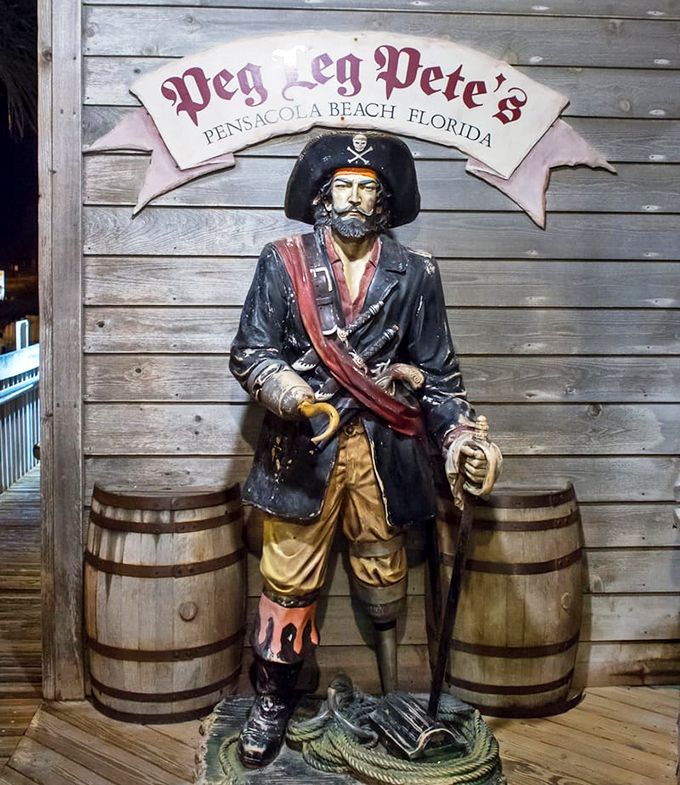 The namesake himself stands guard, a wooden sentinel with a hook hand and stories that improve after a few rum drinks.