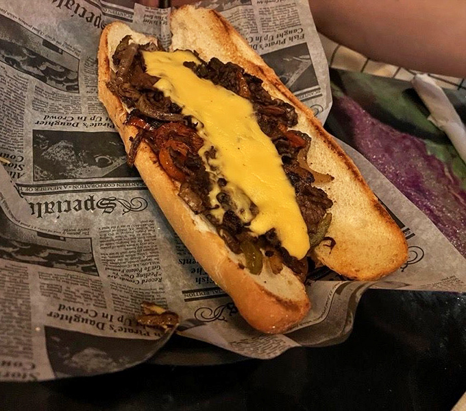 The Philly Cheesesteak&mdash;where thinly sliced beef and molten cheese create the kind of sandwich that makes you temporarily forget your own name.