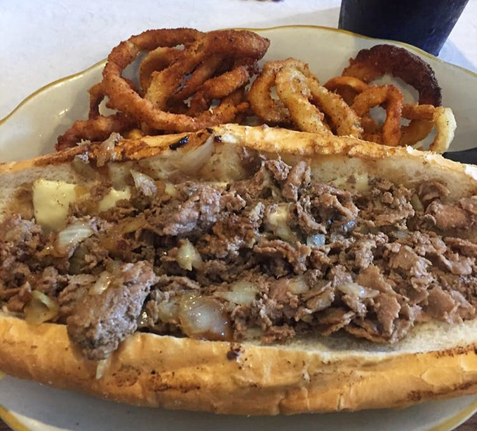 A proper Philly cheesesteak with onion rings that could make a native Philadelphian nod in approval. No passport required for this authentic experience.