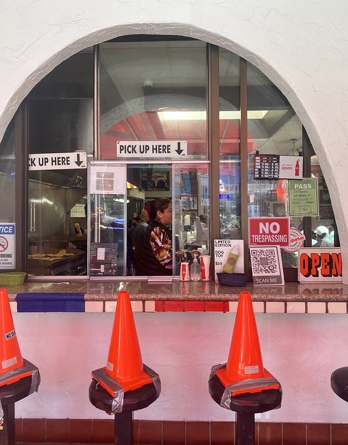 Street-side pickup window serves the neighborhood with efficient service and consistent quality food.