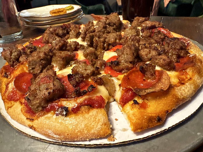 A pizza that doesn't need a passport to impress&mdash;topped with enough meat to make a carnivore blush with delight. 