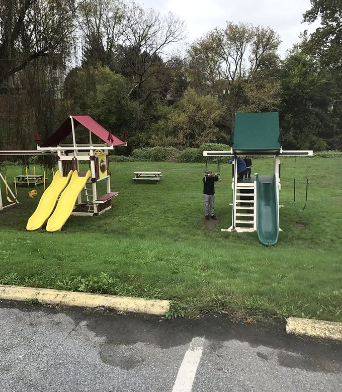 A playground where kids can burn off energy after sitting still for meatloaf. Parenting hack: hungry children become patient when promised both slides and pie.