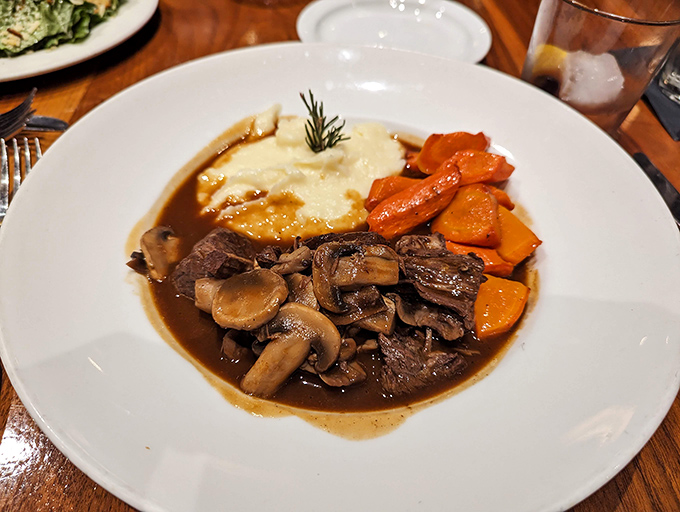 Julia would approve&mdash;tender beef bourguignon swimming in rich burgundy sauce with mushrooms that soaked up all the right flavors.