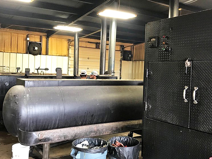 The smoker&mdash;part industrial equipment, part sacred altar&mdash;where the magic happens in a delicate dance of fire, metal, and time.