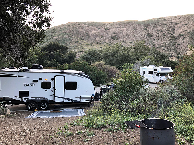 Modern nomads bring their homes on wheels to this slice of paradise. These RV campsites blend convenience with wilderness in perfect harmony.