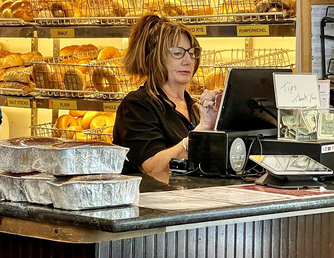 The register area doubles as command central, where orders are called and the magic happens behind those bread-filled shelves. 