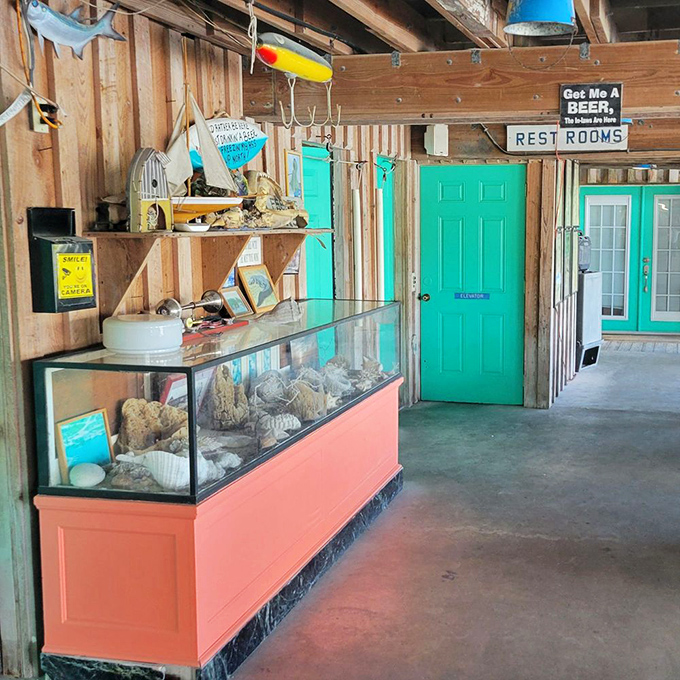 Even the hallway to the restrooms has character, with fishing lures and coastal decor that remind you this place is the real Florida, not the theme park version.