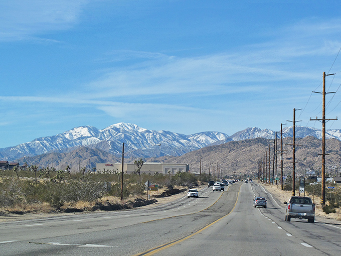 The road to affordable living stretches before you, framed by Joshua trees and mountains that don't charge admission for their daily show.