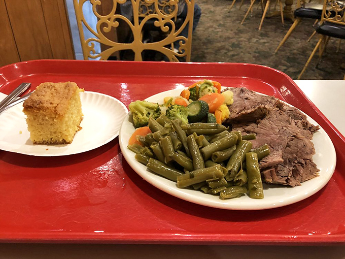 A plate that tells the whole story: tender roast beef, green beans cooked with purpose, and cornbread that doesn't need butter (but deserves it anyway).