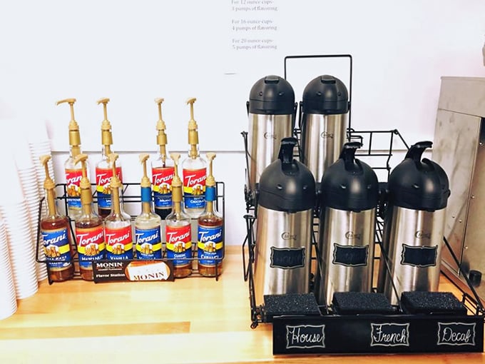 Coffee options lined up like loyal soldiers. The perfect supporting cast for the star of the show&mdash;the donuts.