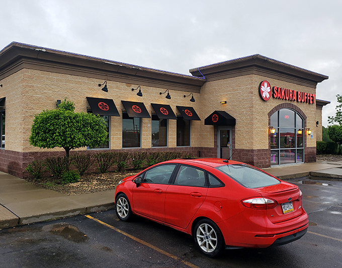 Even on a rainy day, Sakura Buffet's bright red awnings promise a culinary journey that requires no passport&mdash;just an appetite for adventure.
