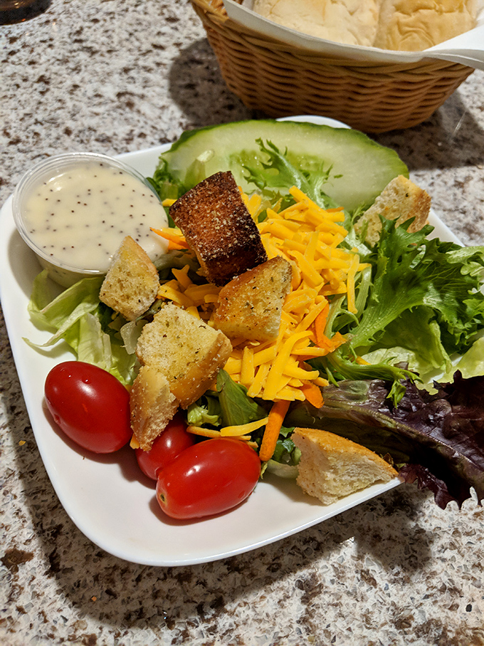 A house salad that refuses to be a boring obligation&mdash;those homemade croutons have purpose and conviction.
