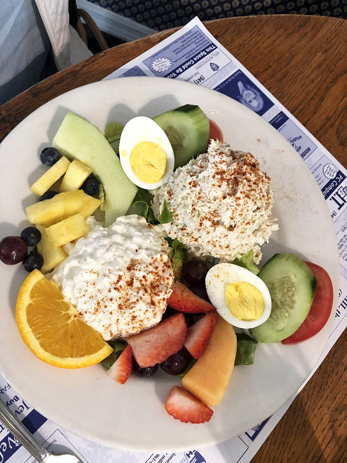 A fruit and cottage cheese plate that somehow makes healthy eating look like a reward rather than a punishment&mdash;the breakfast equivalent of finding money in old pants.