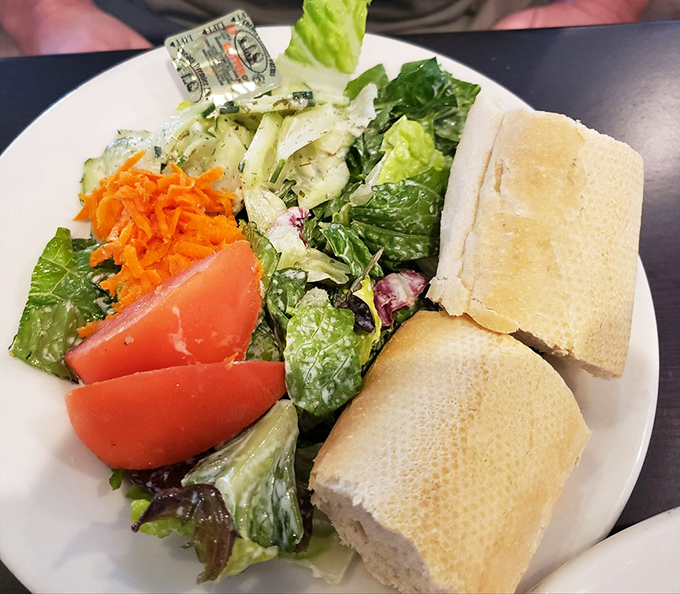 Even the salad plate shows German precision: fresh greens, vibrant vegetables, and crusty bread&mdash;because balance matters, even in a schnitzel paradise.