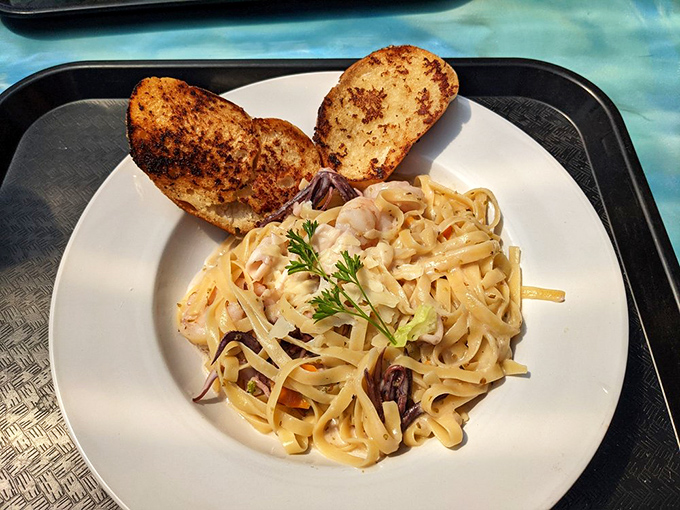 Seafood pasta that makes you wonder why tomato sauce gets all the attention. This creamy masterpiece brings the ocean to Italian night.