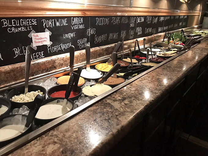 The salad bar blackboard reads like a treasure map, with "bleu cheese crumbles" and "horseradish" marking the spots X.
