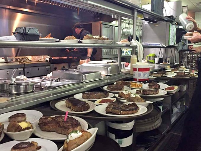 Behind the scenes, the kitchen operates with precision, turning out perfectly cooked steaks with military-like efficiency.