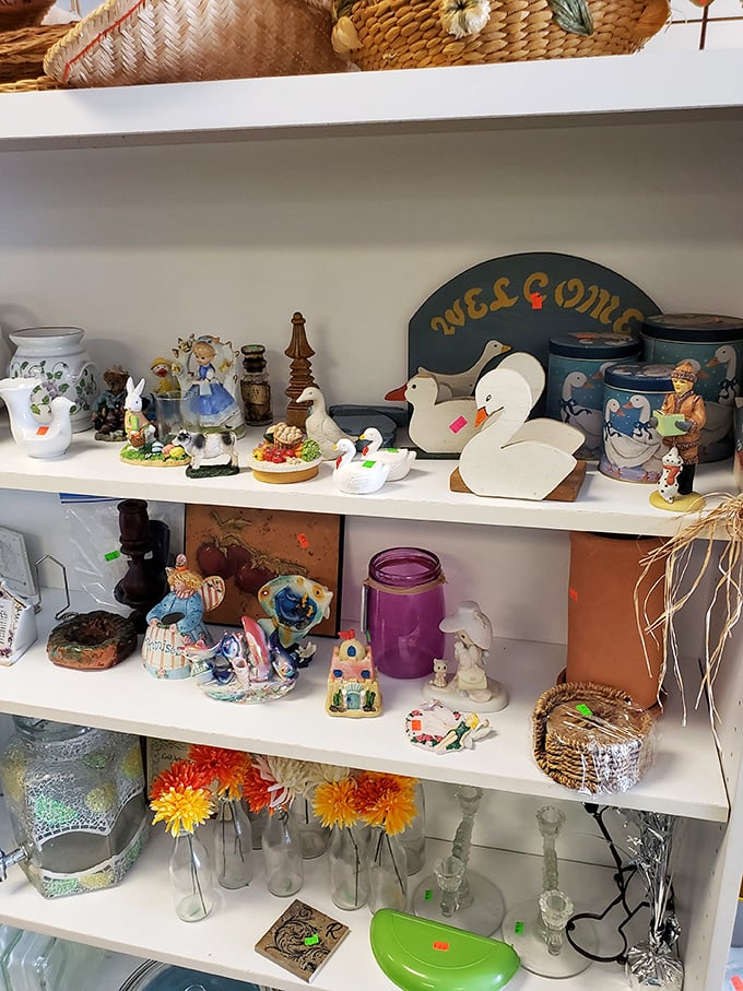Whimsical duck figurines and vintage glassware await new homes. One shopper's kitsch is another's perfect shelf accent.