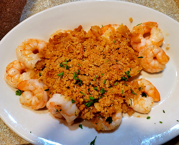 Shrimp arranged like a sunburst, crowned with golden crumbs. It's not just dinner&mdash;it's edible architecture that tastes even better than it looks.