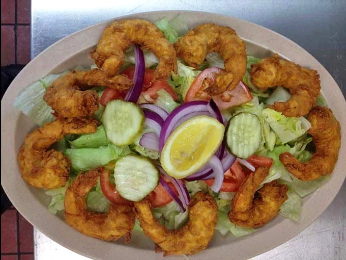 Who says salad can't be exciting? Plump fried shrimp circle this fresh garden creation like a delicious golden crown.
