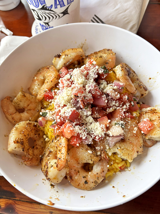 This isn't just shrimp and rice &ndash; it's a colorful celebration bowl where plump Gulf shrimp mingle with fresh vegetables in a dish that screams "vacation mode: activated!
