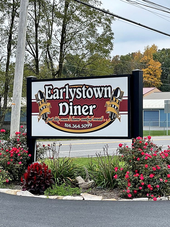 The sign promises "just like mom's home cooked meals," and unlike most roadside promises, this one's actually kept. Those roses aren't just landscaping&mdash;they're a welcome committee.