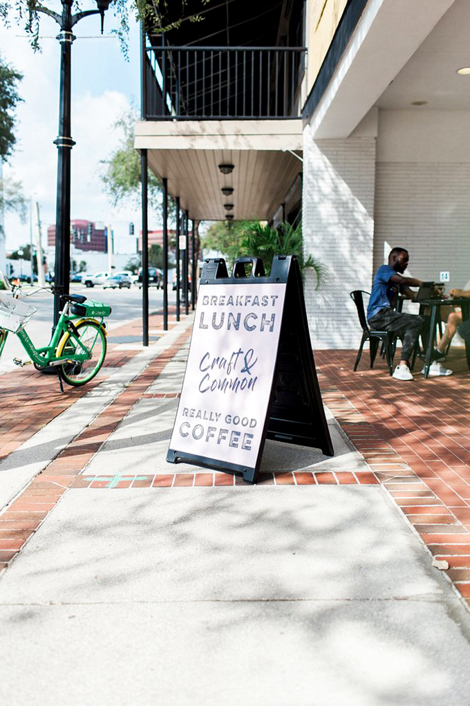 That logo says it all &ndash; "CRAFT & COMMON" isn't just a name, it's a philosophy spelled out in gold against crisp white.