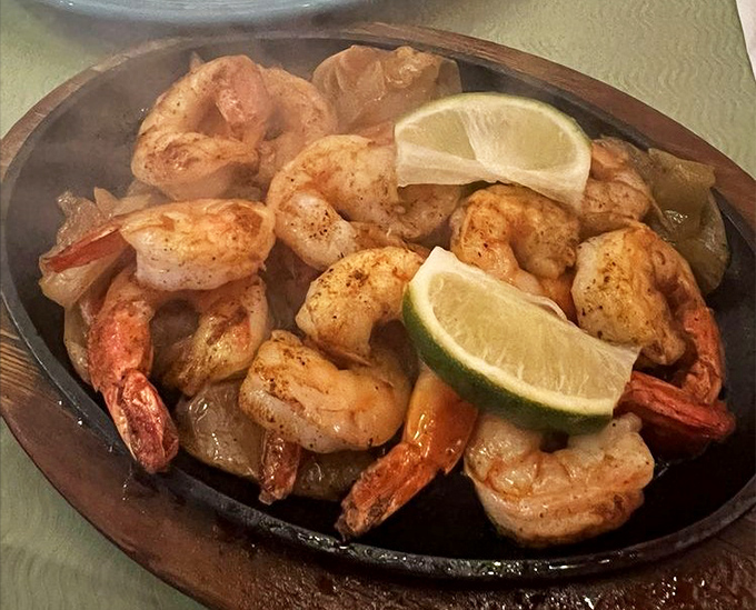 Shrimp that demand your full attention. These plump beauties, perfectly seasoned and served with lime wedges, are the ocean's gift to your taste buds.