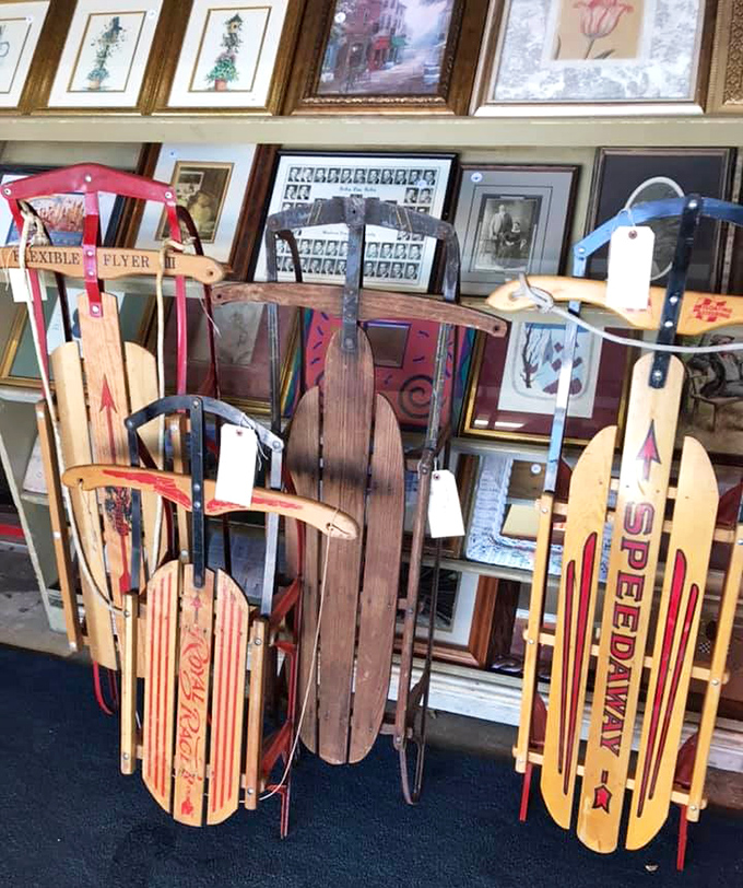 Classic wooden sleds wait patiently for snow, carrying memories of winters when kids weren't glued to screens.