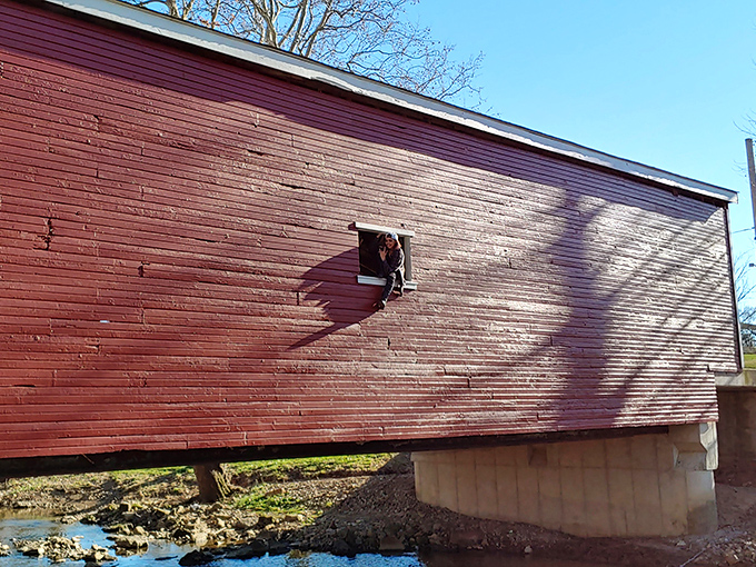Even bridges need windows. This small opening provides a peek into the structural soul of Roberts Bridge, where craftsmanship meets necessity.