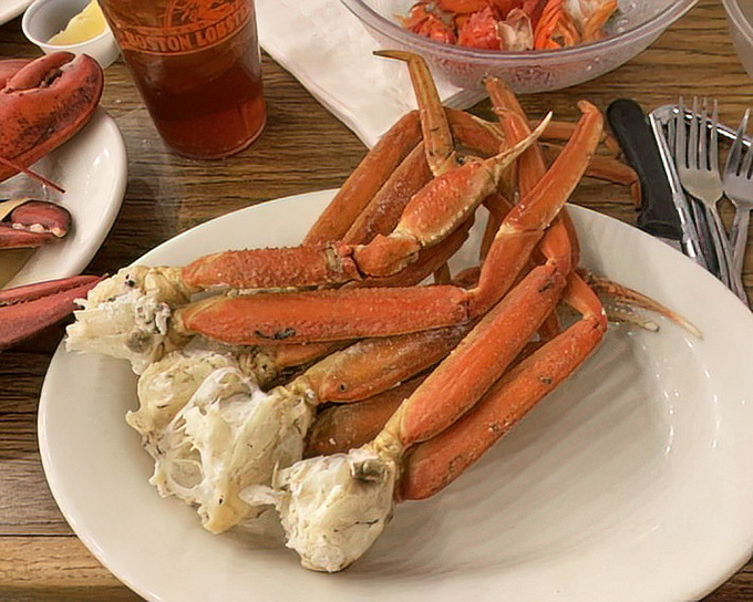 Snow crab legs arranged like nature's perfect eating utensils &ndash; delivering sweet meat that's worth every bit of cracking effort.