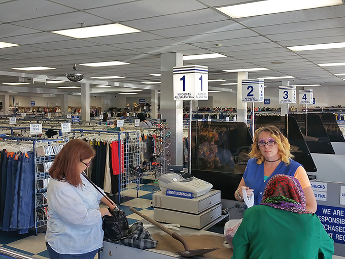 The checkout line: where strangers become temporary friends, united by the universal thrill of scoring something wonderful for next to nothing.