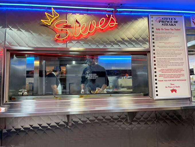 Under the glow of the neon crown, sandwich artisans perform their craft with the focus of diamond cutters and the speed of NASCAR pit crews.