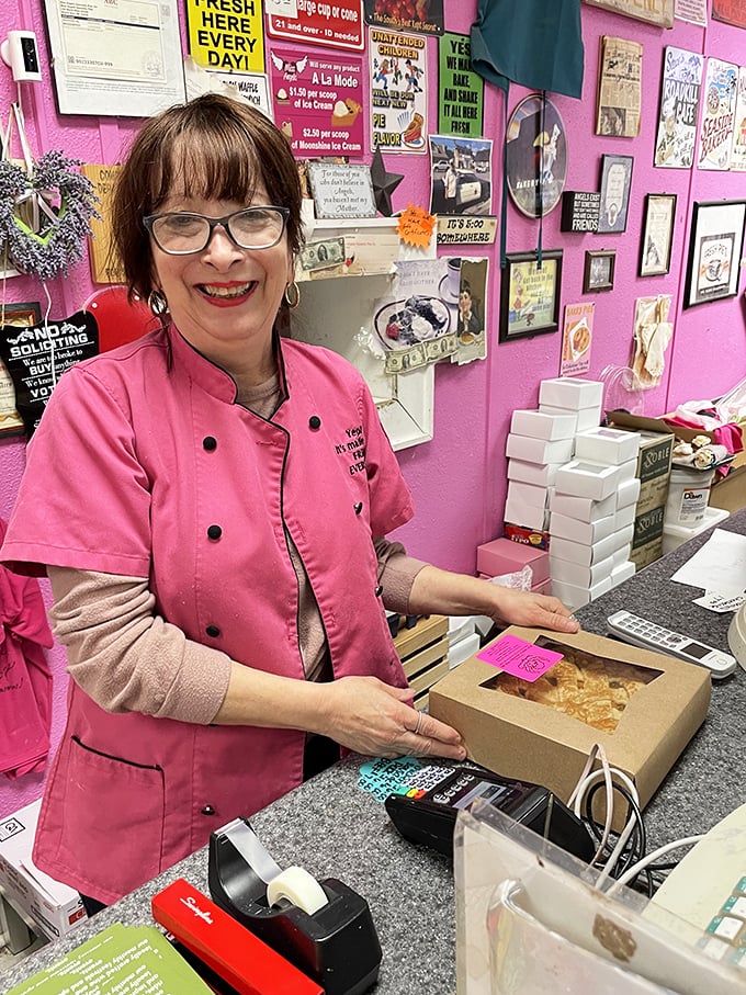 The pink-clad pie whisperer, packaging happiness in cardboard boxes since whenever and making the world better one slice at a time.