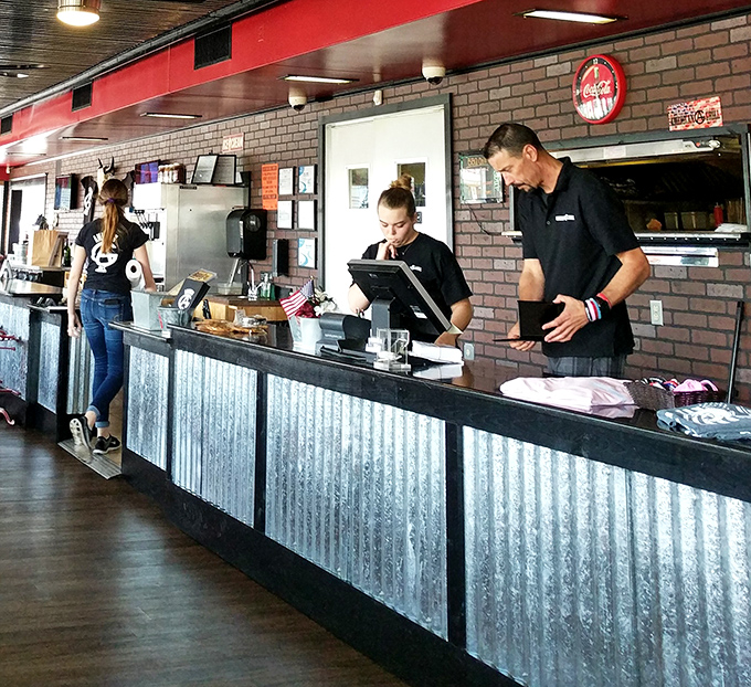 These hardworking hands craft each order with the kind of care that turns first-time visitors into lifelong regulars.