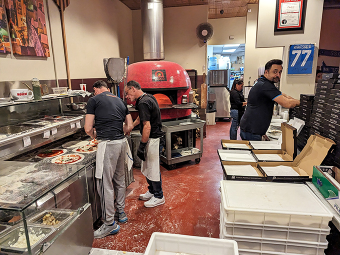 Behind every great pizza is a team of dedicated professionals. These aren't just cooks&mdash;they're guardians of tradition.