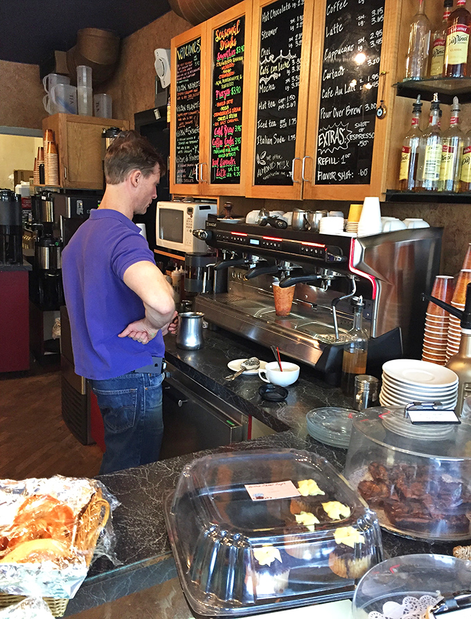 Barista concentration face: that moment of focused craftsmanship that separates coffee from exceptional coffee.