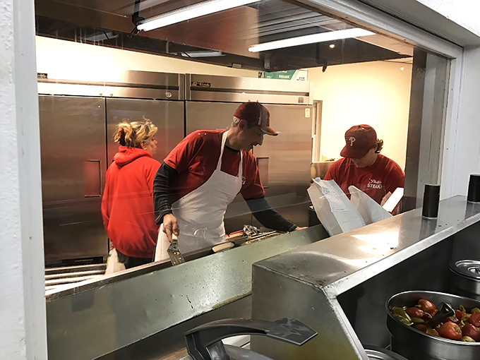 The choreography of sandwich creation happens behind the scenes. Practiced hands work with focused precision at Philip's.