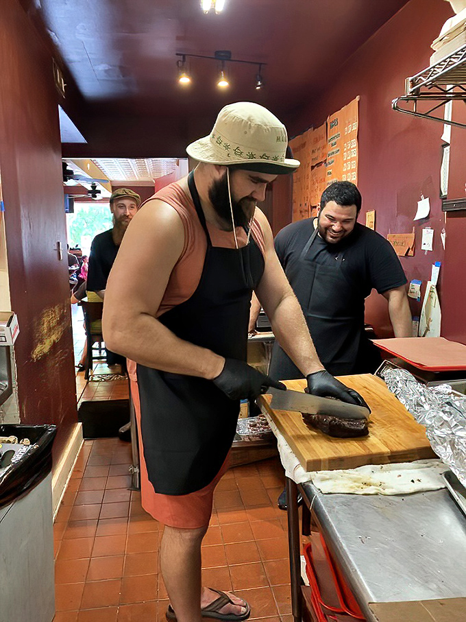 Craftsmanship in action: The careful slicing of brisket requires the focus of a surgeon and the respect of someone handling liquid gold.