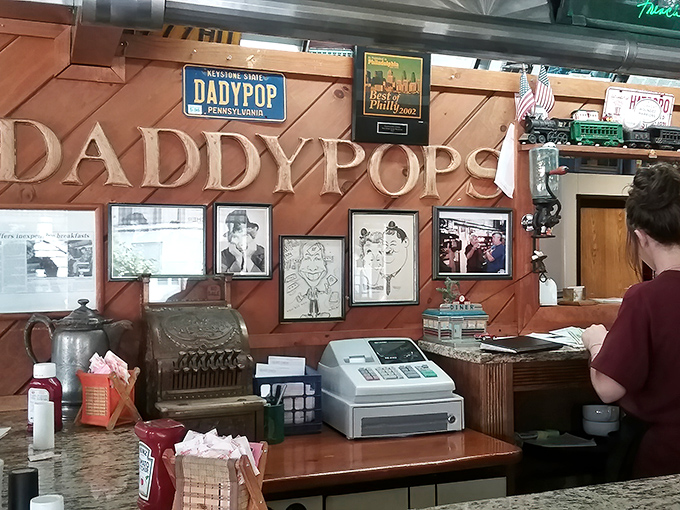 The wall of memories behind the register reminds you that you're not just eating breakfast&mdash;you're becoming part of Daddypops history.