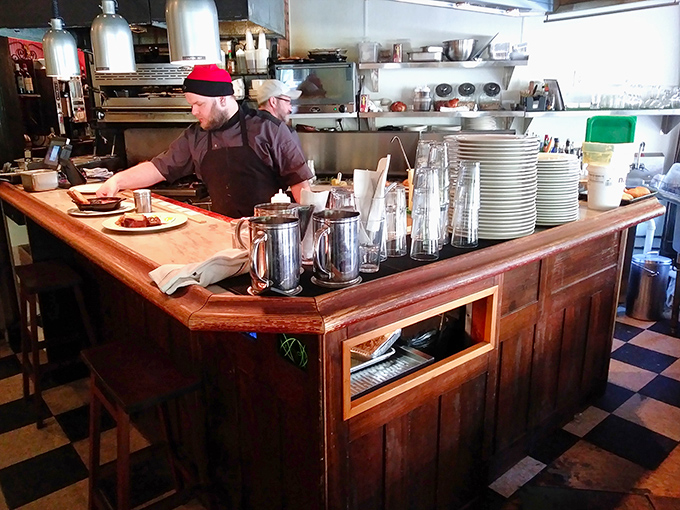 Behind every perfect croque monsieur is a team that understands the architecture of flavor. The kitchen ballet is performed with practiced precision.