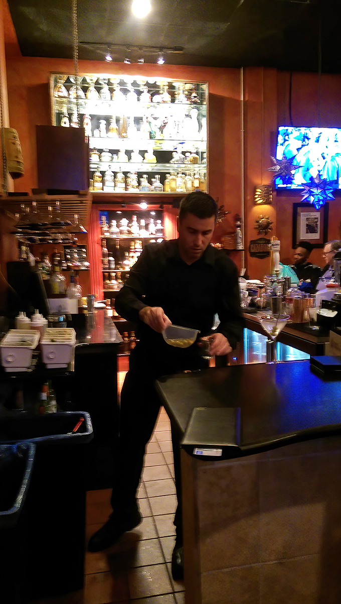 Cocktail crafting becomes performance art as skilled hands transform simple ingredients into something worth putting down your phone for.