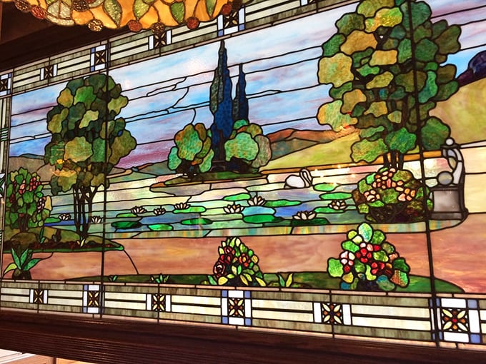 The stunning stained glass artwork transforms ordinary morning light into a kaleidoscope of color while you sip your coffee.