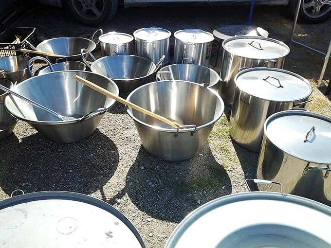 These industrial-sized cooking pots have seen more family reunions than your Facebook feed—ready for their next barbecue adventure.