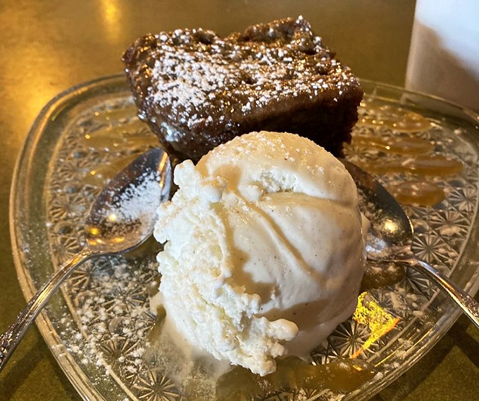 This sticky toffee pudding with vanilla ice cream isn't just dessert; it's the sweet finale your taste buds have been waiting for all evening.
