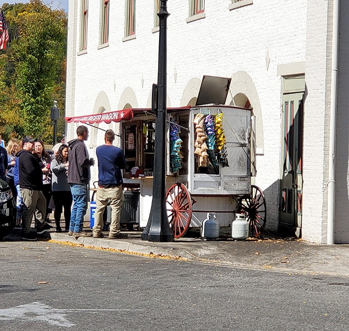 Fall foliage provides the perfect backdrop for burger pilgrims making their way to the wagon. Some people chase leaves, others chase flavor.