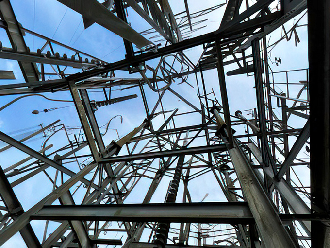 Gazing upward through the metal skeleton reveals a dizzying perspective that challenges your sense of space and dimension.