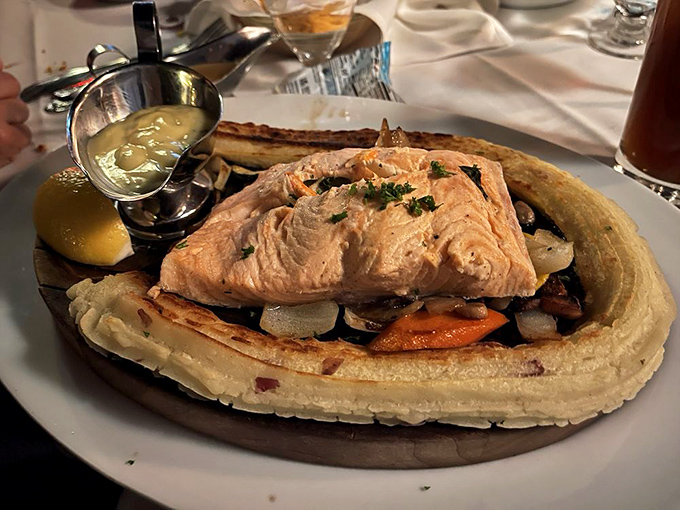 This salmon arrives on its own wooden plank like Moses delivering the commandments of seafood perfection.